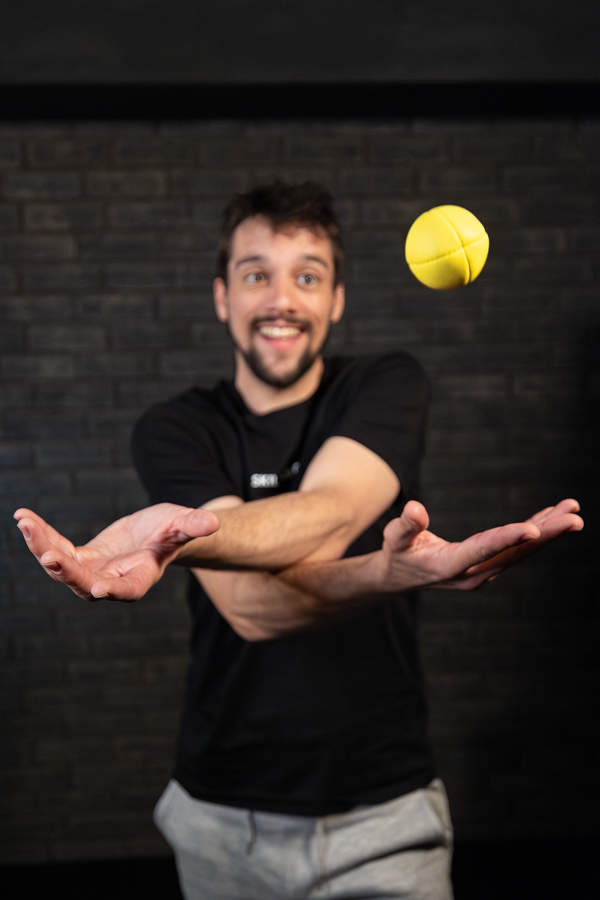 Learn Under the Arm Throw Trick - Skill Addicts learning mobile app