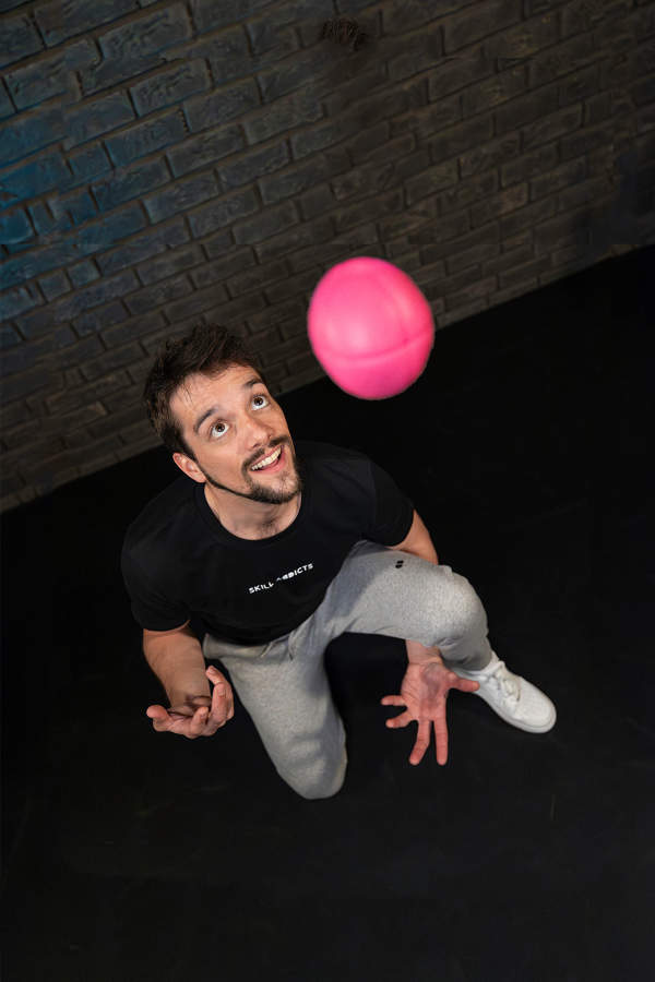 Learn Under the Leg Throw Juggling Trick - Skill Addicts learning ...